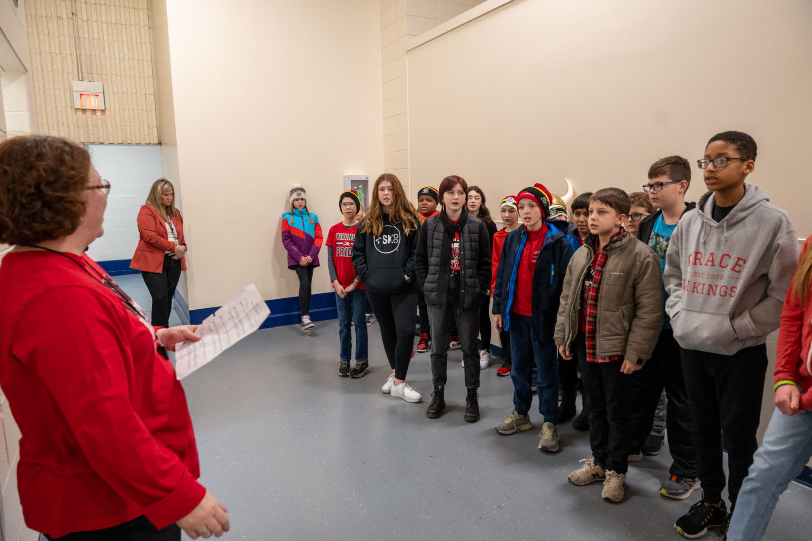 Grace Choir Sings at the Chicago Wolves Game! - Grace Lutheran School